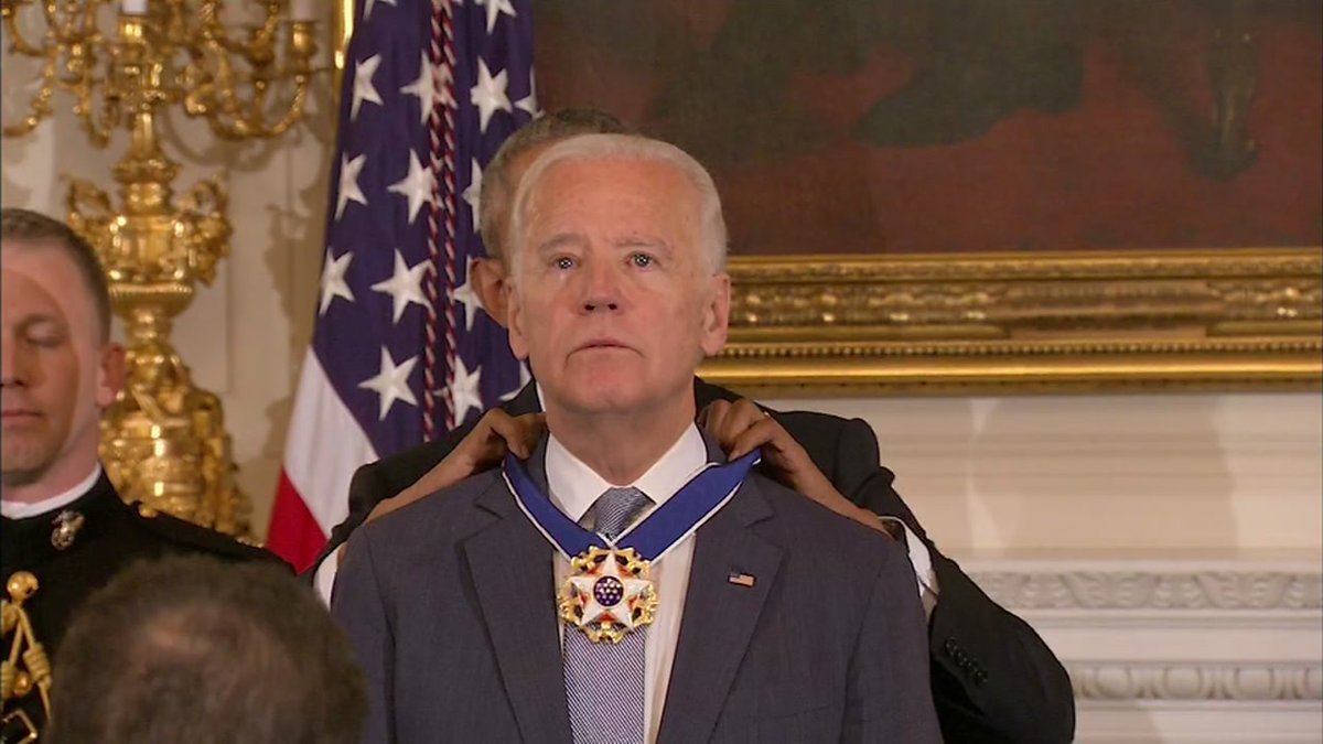 President Barack Obama surprises Vice President Joe Biden with the ...